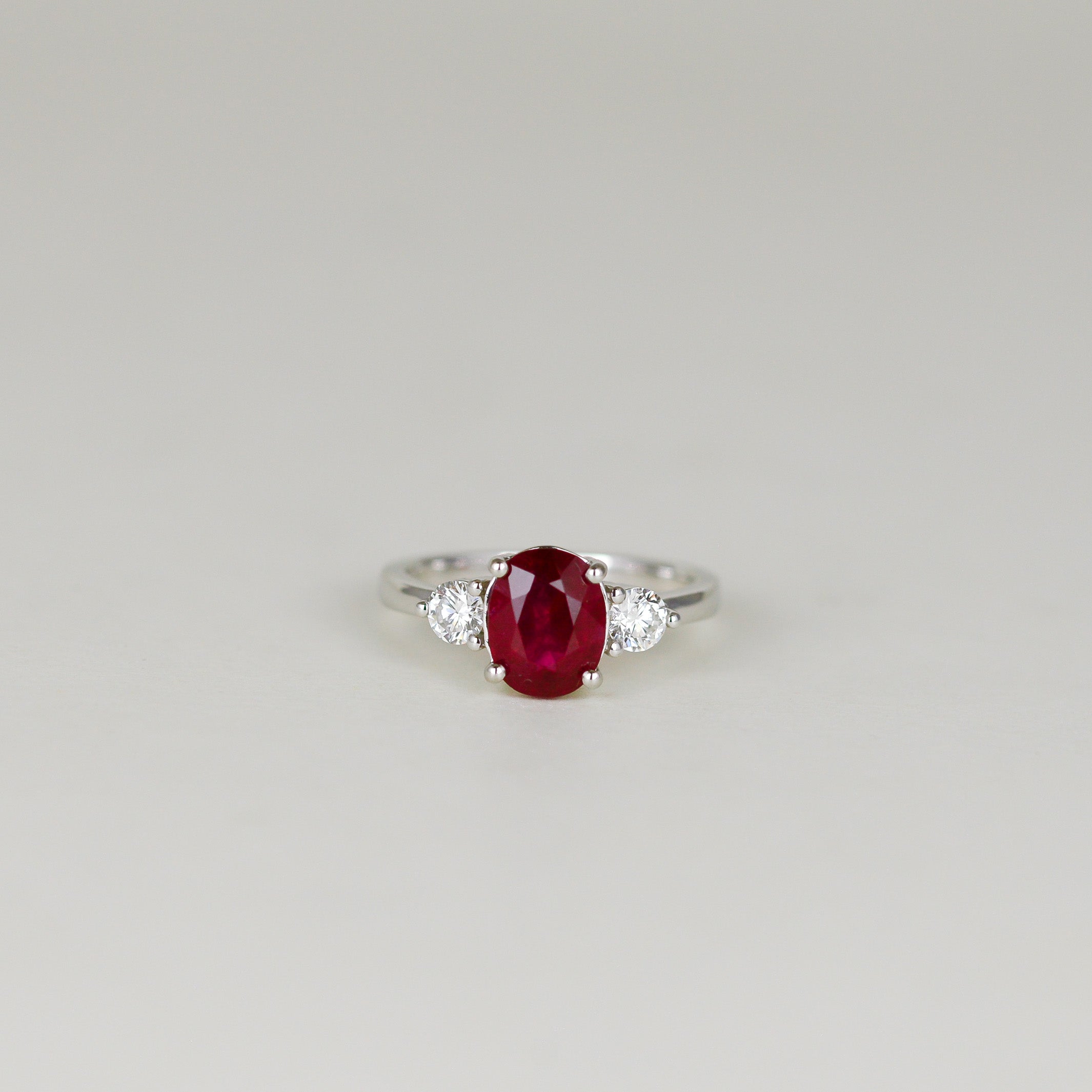 Platinum 2.39ct Oval Ruby and Diamond Three Stone Ring